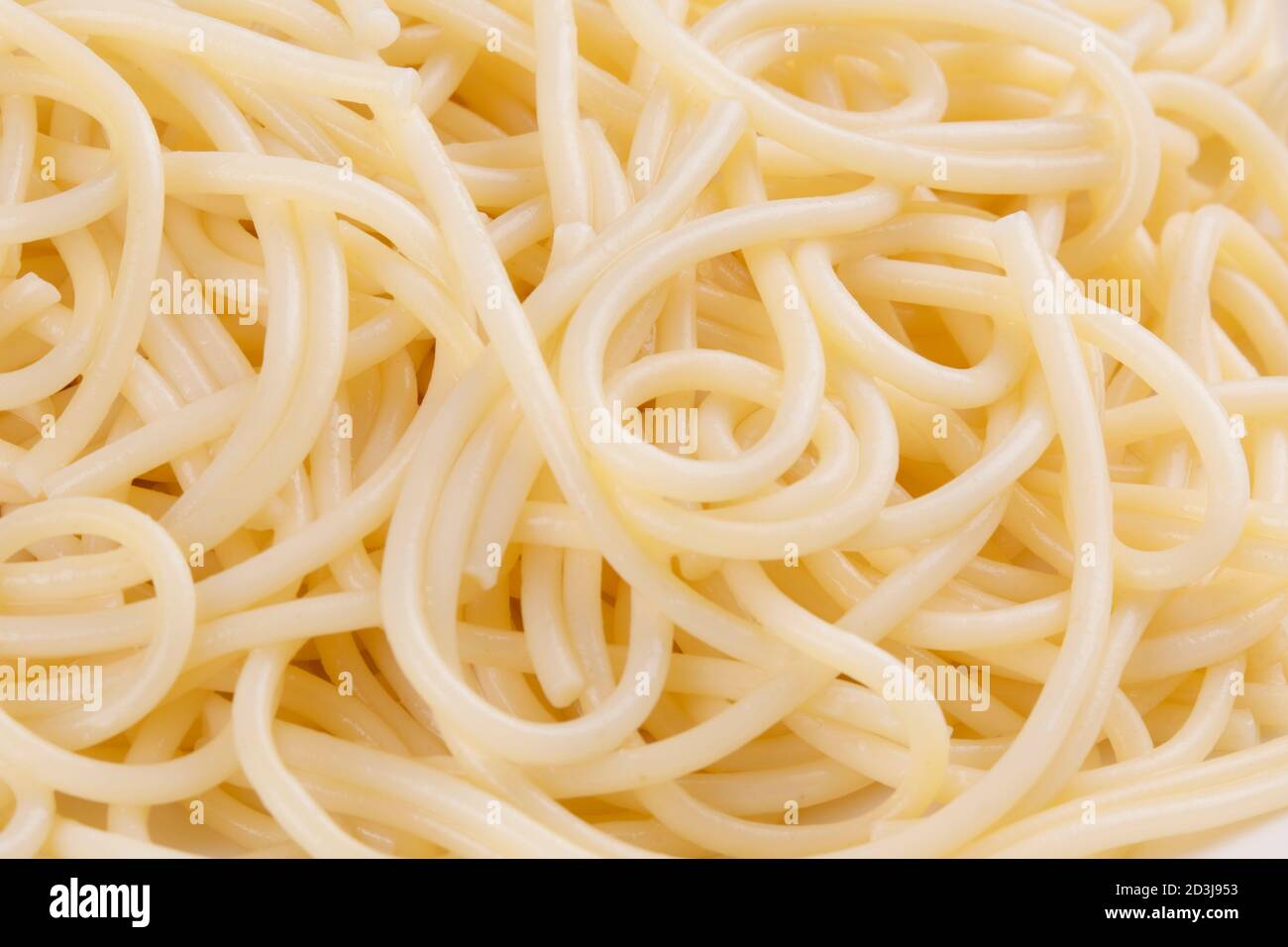 A plate full of cooked spaghetti with copy space Stock Photo - Alamy