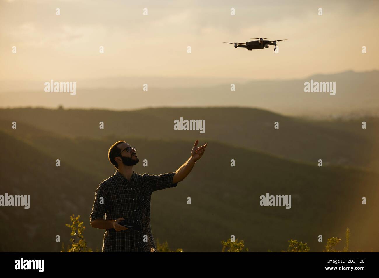 Man landing drone in nature hi-res stock photography and images - Alamy