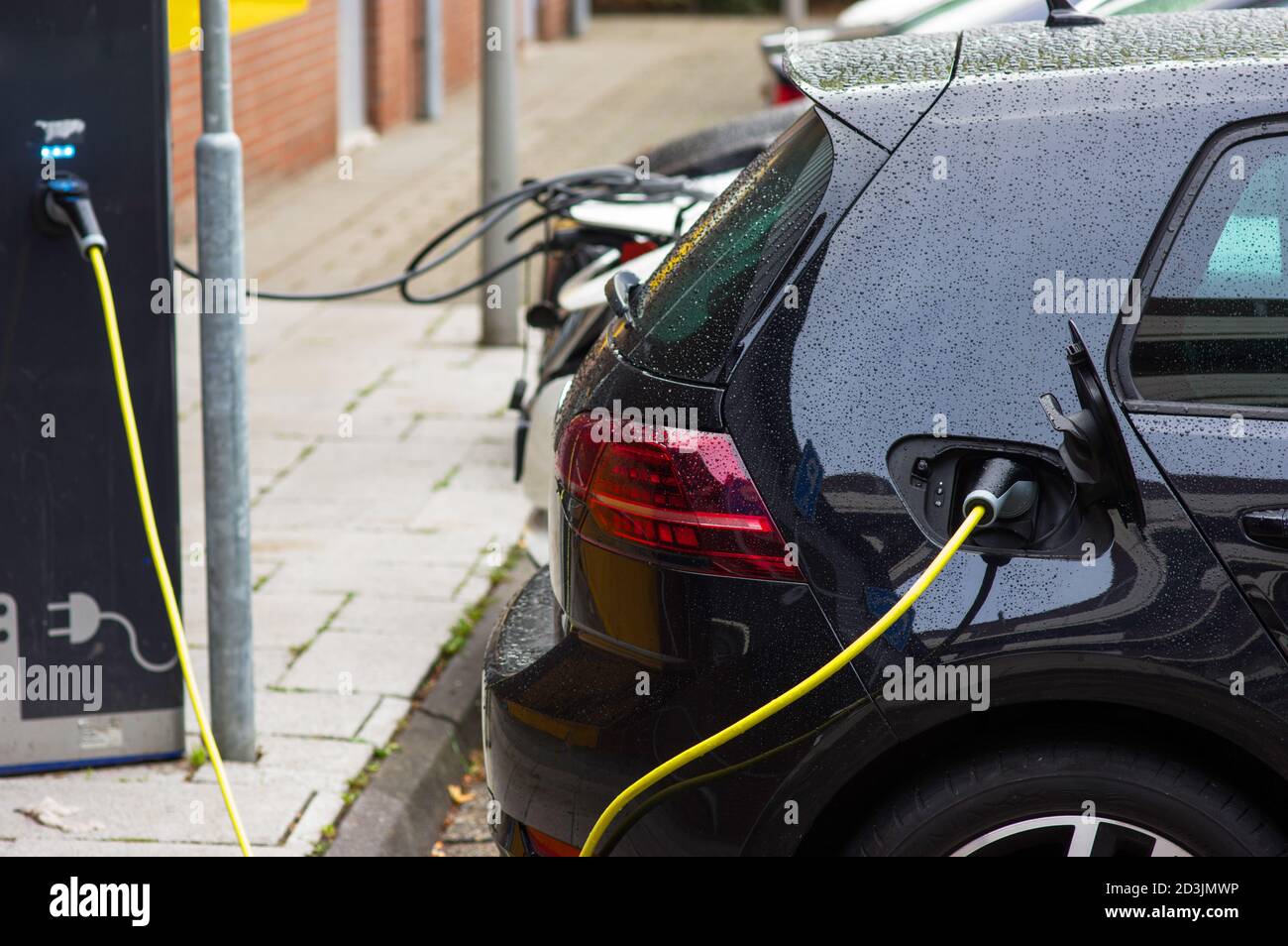 Power plug of a electric car with the charger cable attached Stock ...