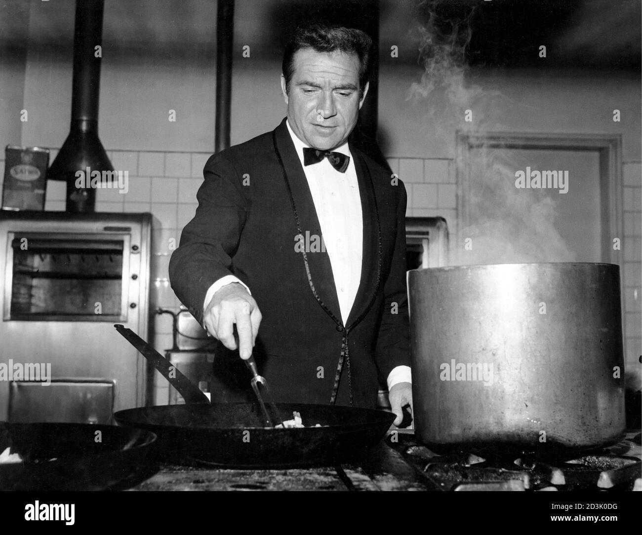 Italian actor cooking Black and White Stock Photos & Images - Alamy