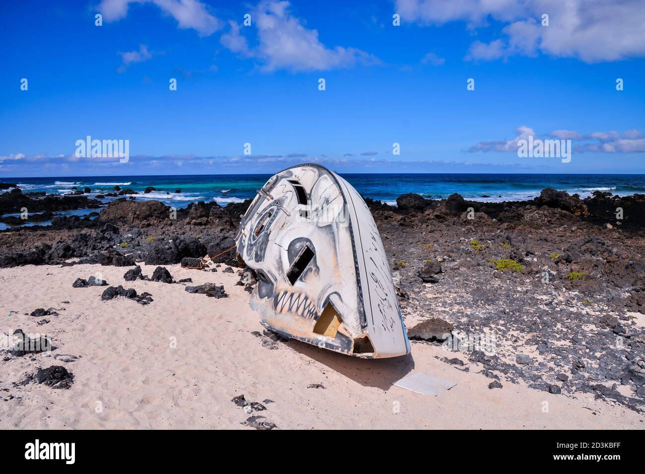Sailboat stranded on the beach after a storm Stock Photo - Alamy