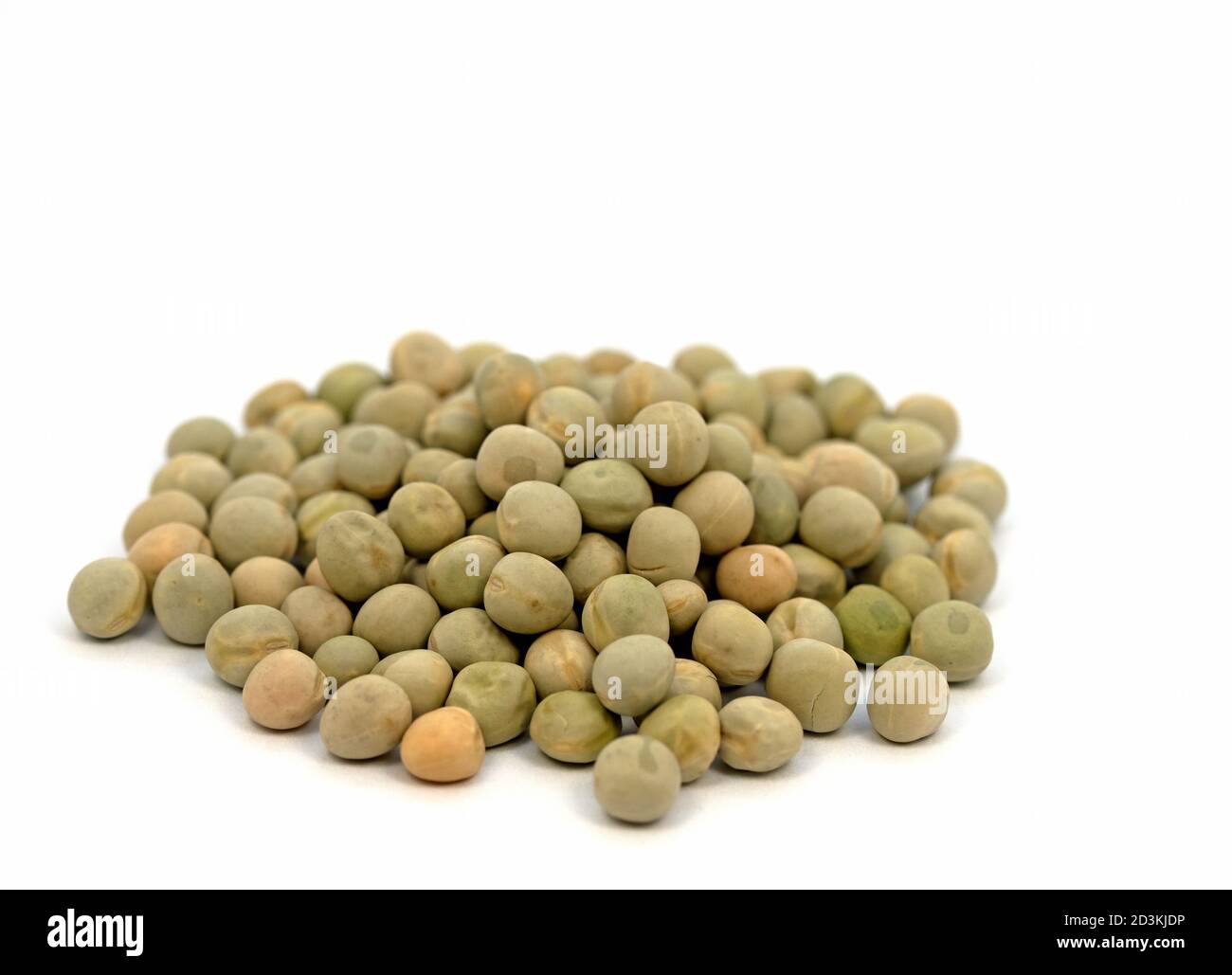 Dried peas against a white background Stock Photo - Alamy