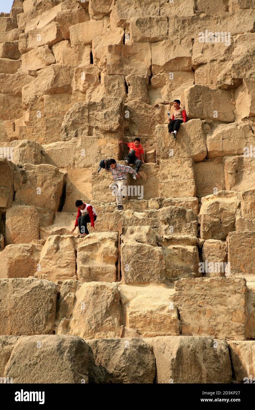 View of the pyramid in Giza near Cairo, where tourists climb on ...