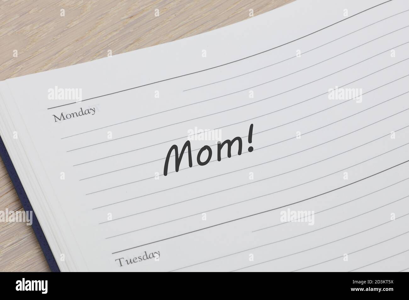 Mom reminder note in a diary page Stock Photo - Alamy