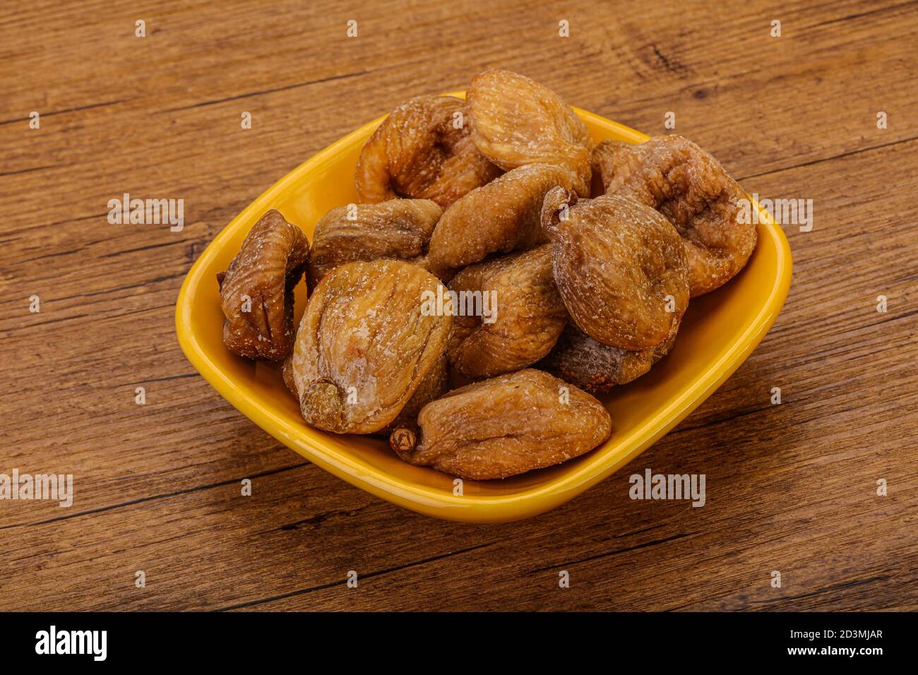 Dry sweet fig fruit heap snack Stock Photo - Alamy
