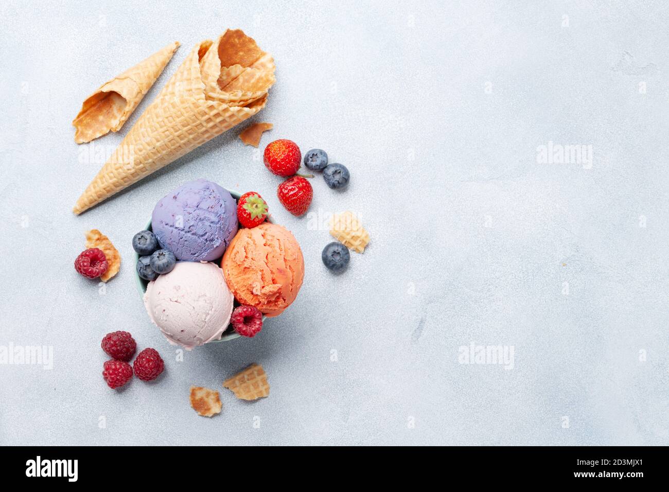 Berry and vanilla ice cream sundae. Top view flat lay with copy space ...