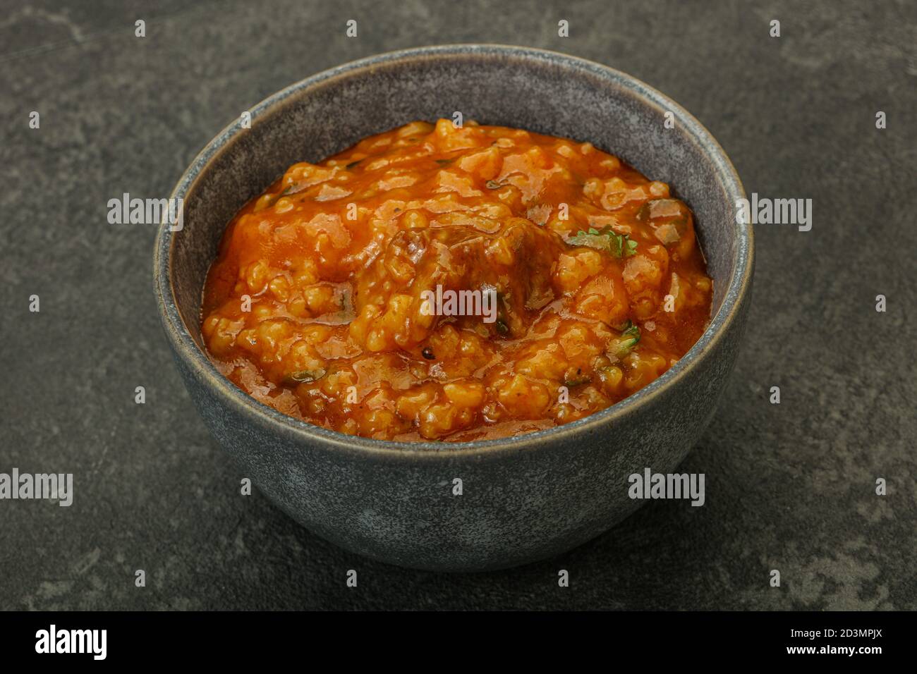 Traditional Georgian Kharcho soup with meat and spices Stock Photo - Alamy