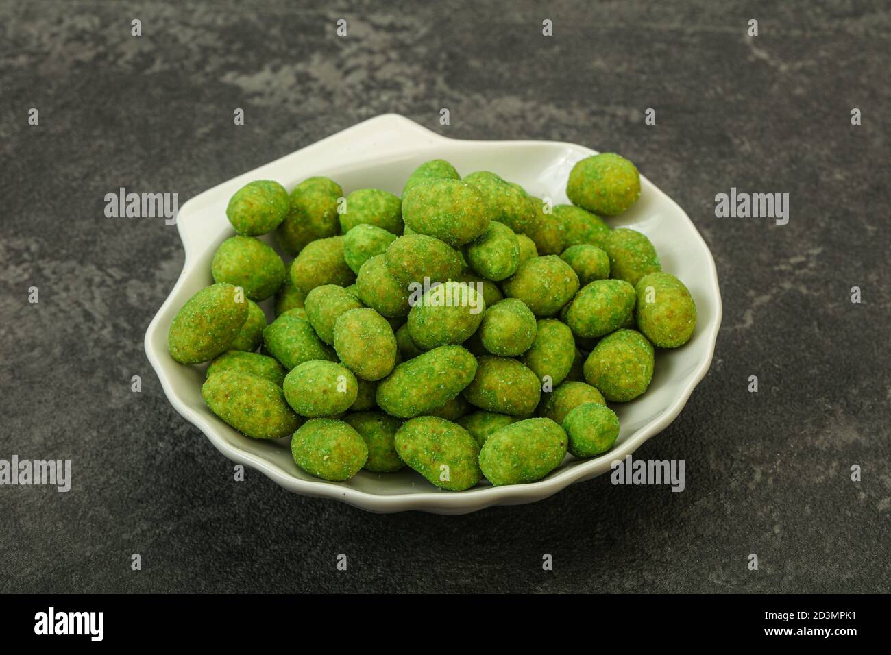 Spicy wasabi peanuts snack in the bowl Stock Photo - Alamy