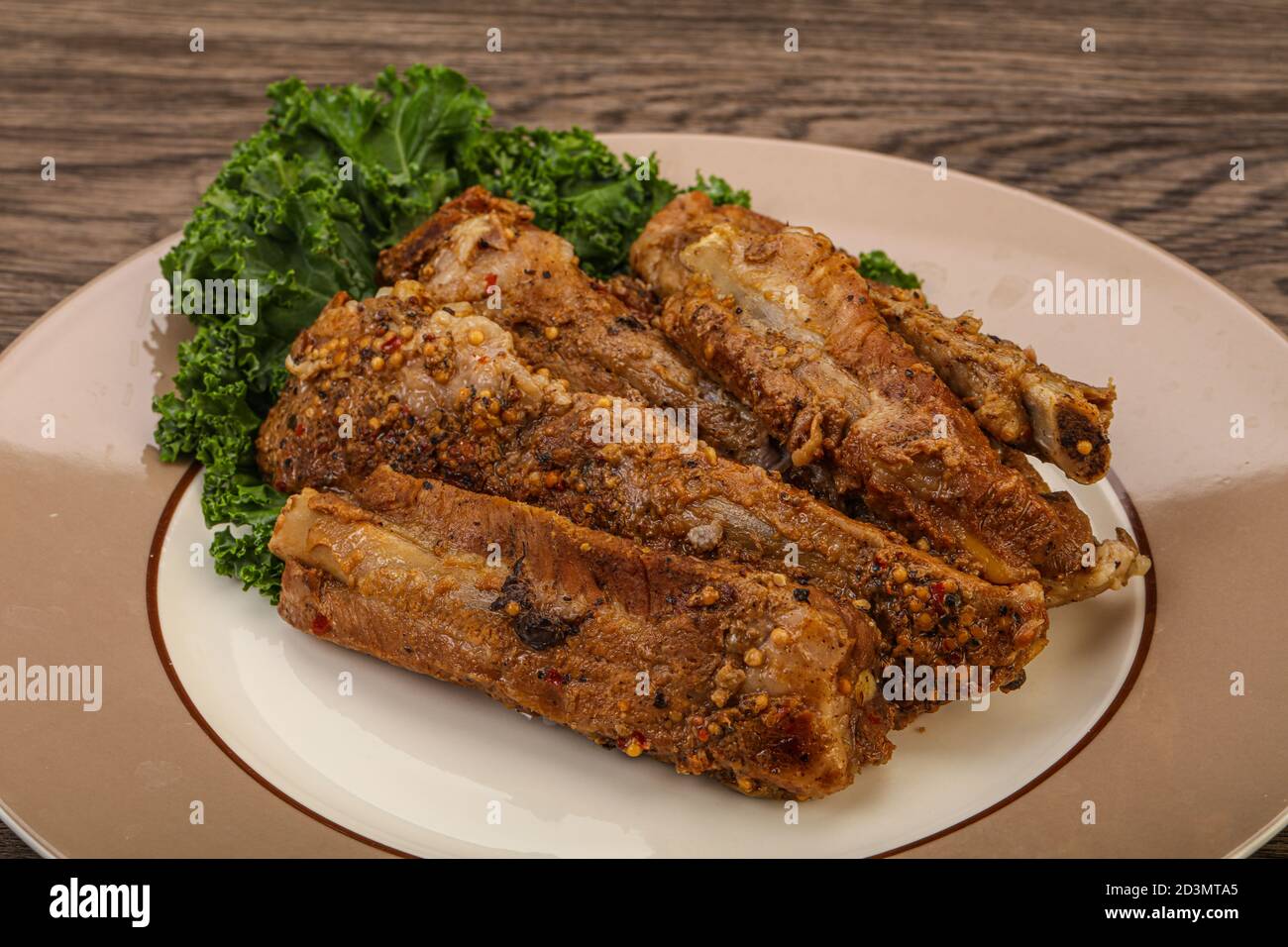 Stewed pork ribs with spices and herbs Stock Photo - Alamy
