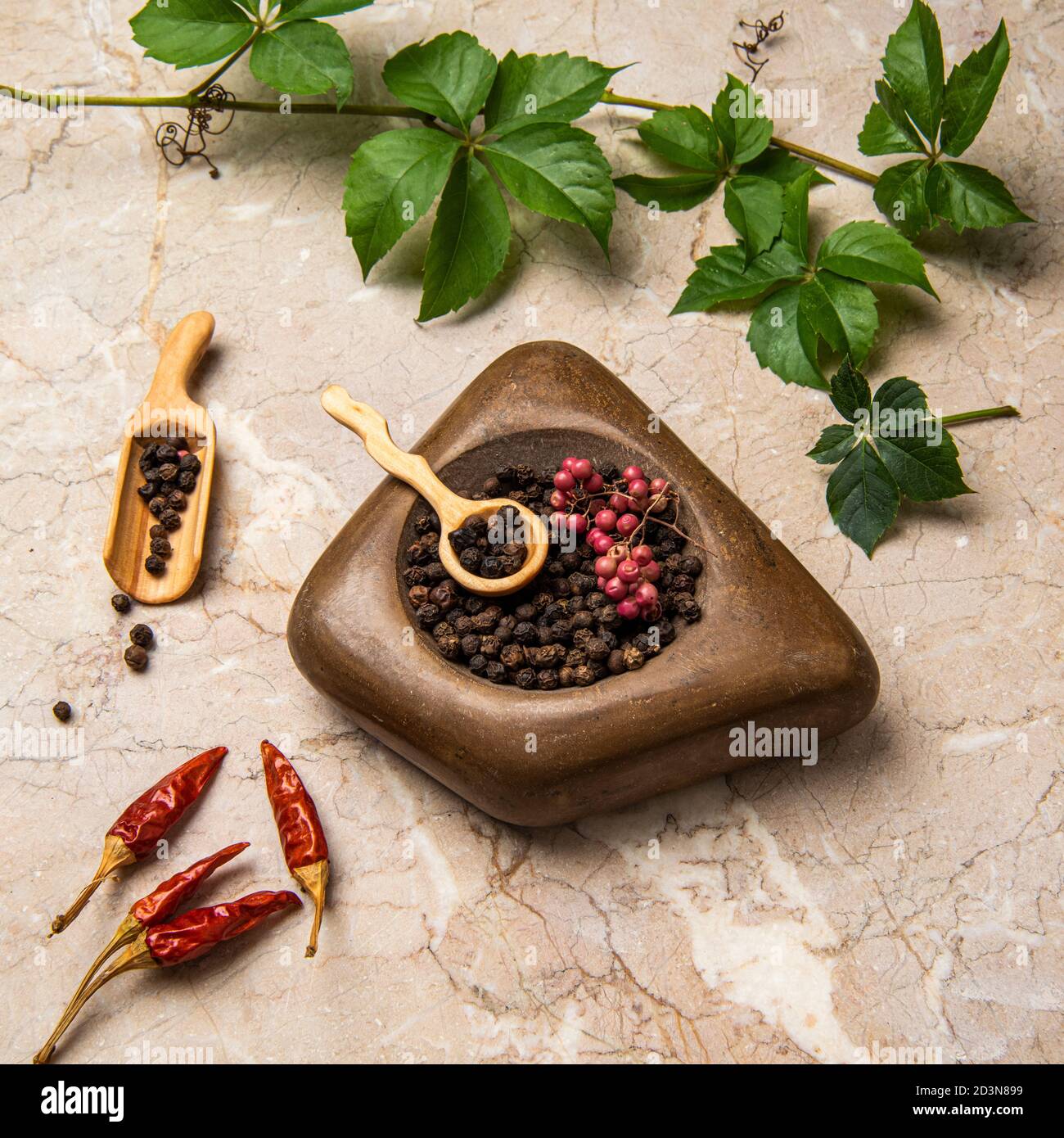 natural stone bowl handcrafted with spices Stock Photo - Alamy