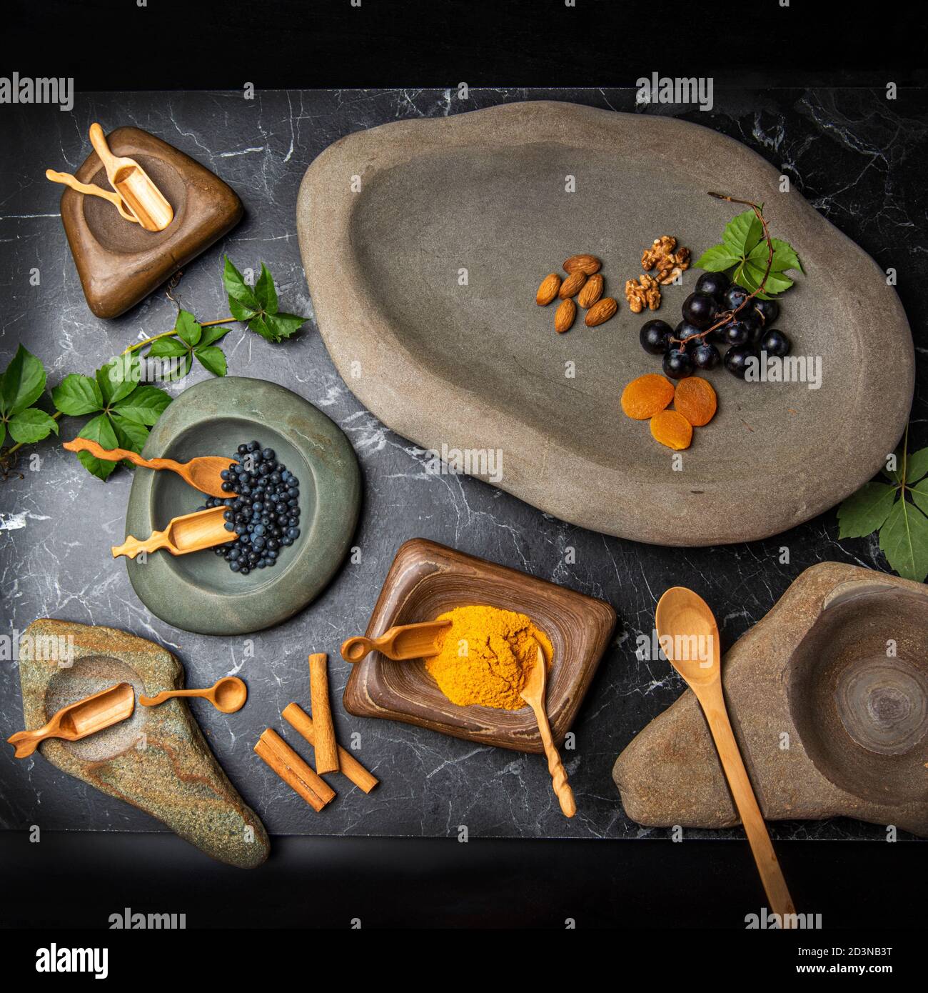 natural stone bowl handcrafted with spices Stock Photo - Alamy