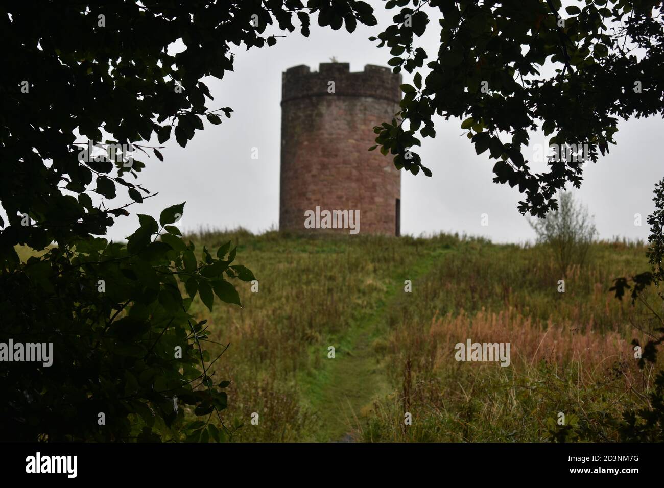 Castle windmill on hill in Scotland Stock Photo - Alamy
