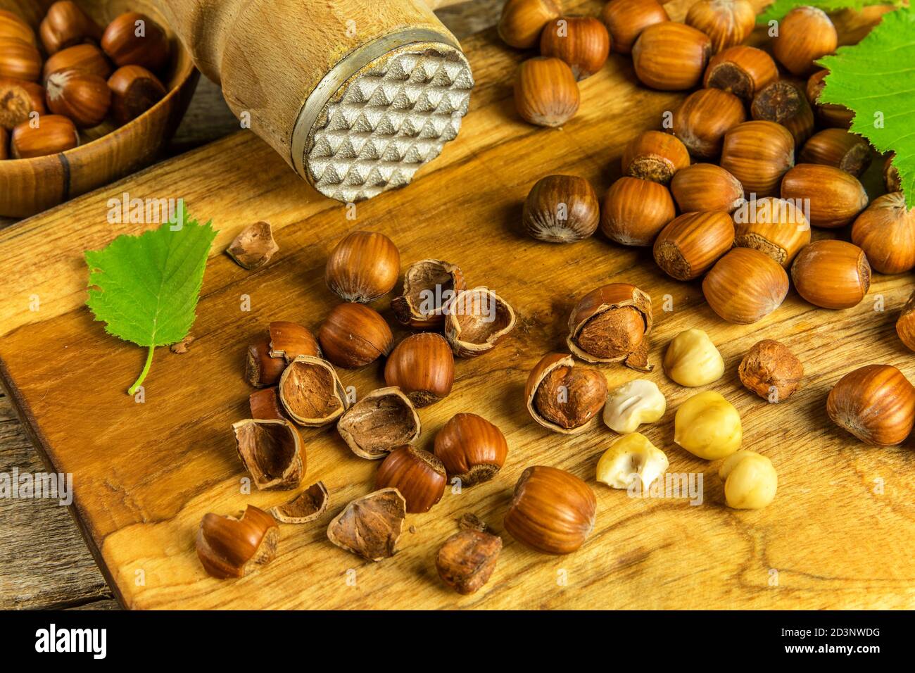 hazelnuts on wooden table, top view. Food background. Heap of many ...