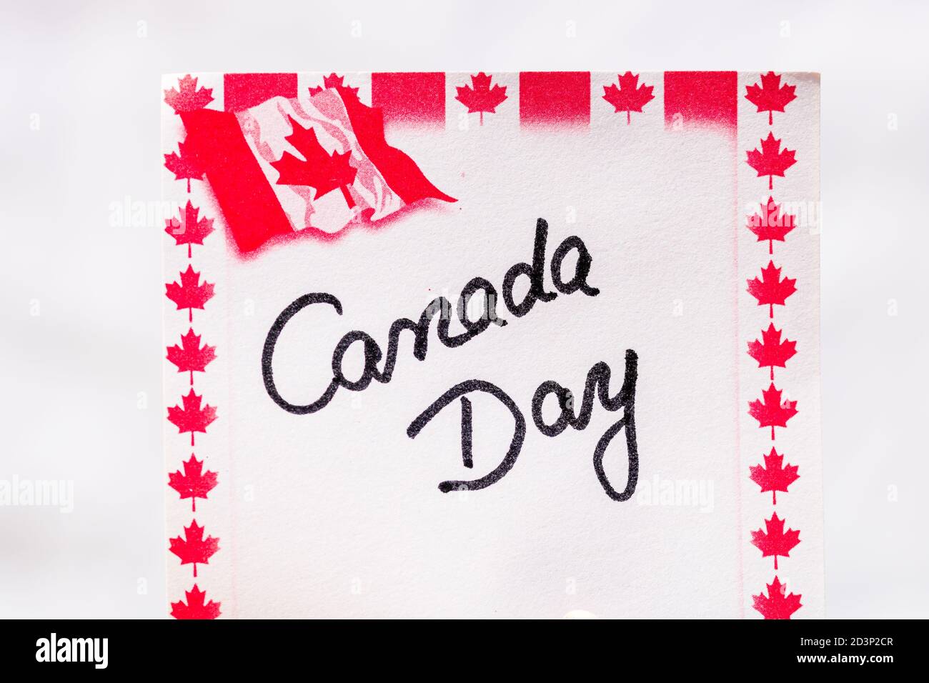 Canada day handwriting on paper with Canada flag. Writing text on memo ...
