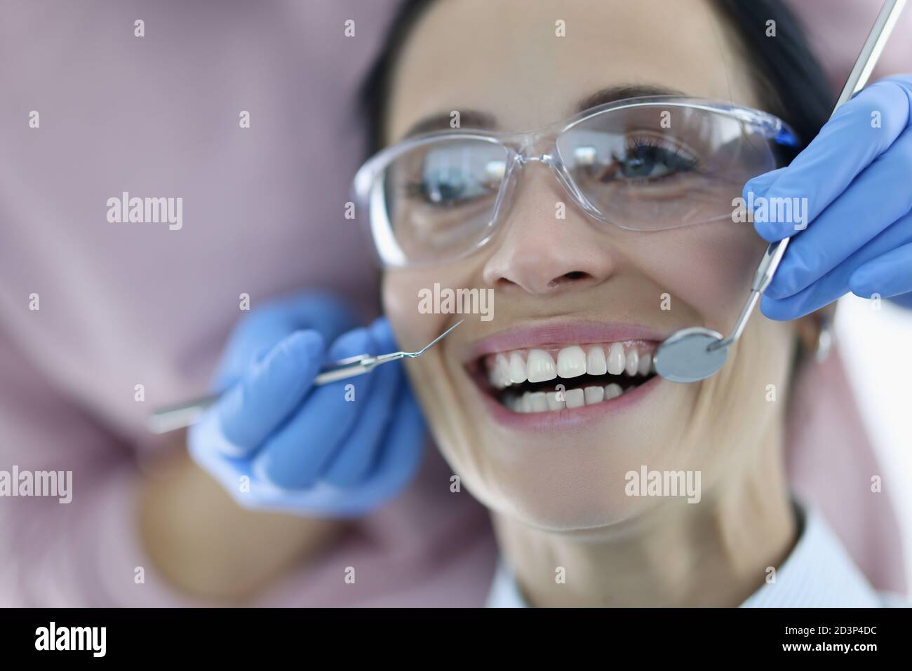 Portrait of woman with her mouth wide open at dentist appointment Stock ...