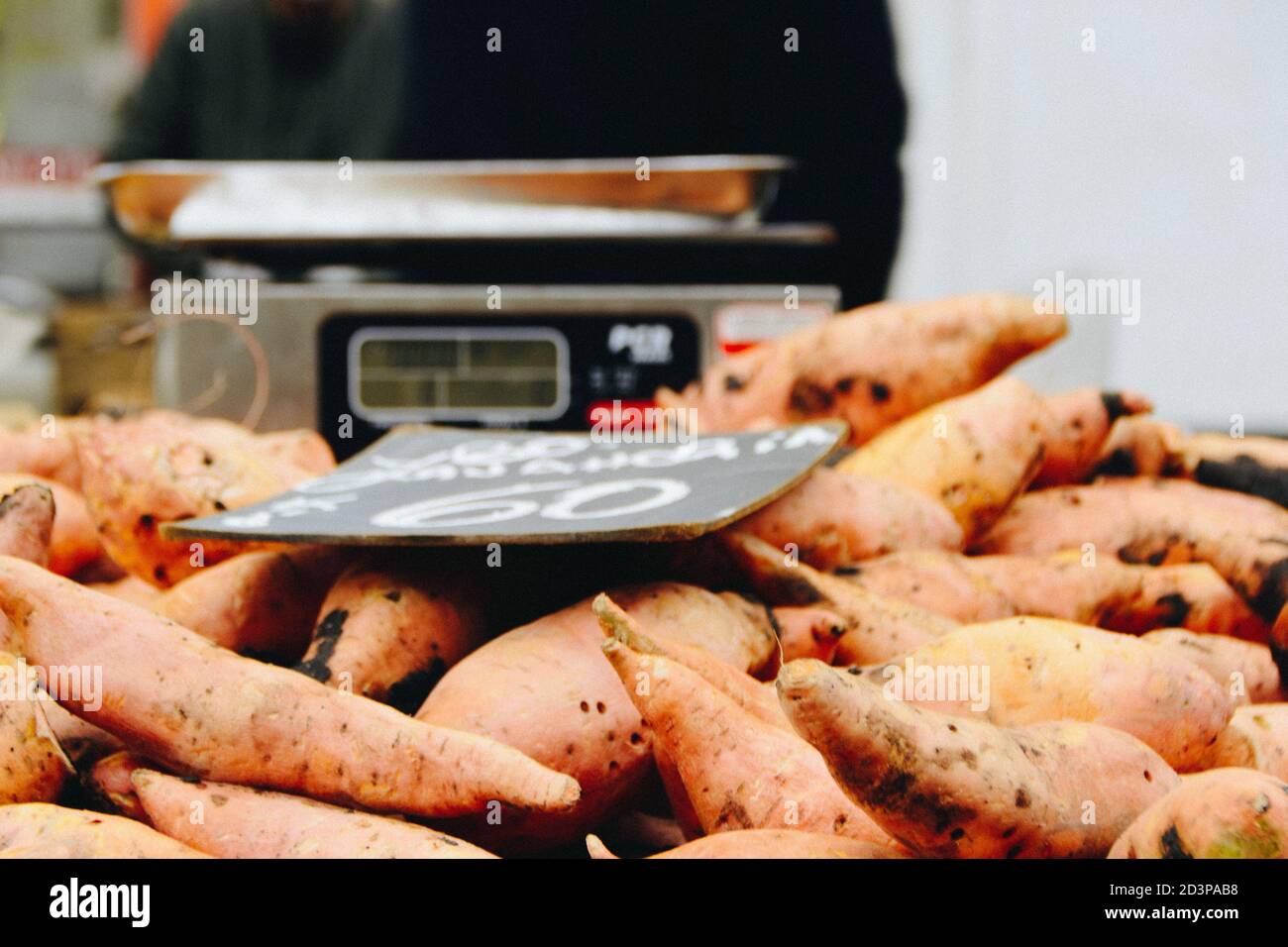 Sweet potato and a balance Stock Photo - Alamy