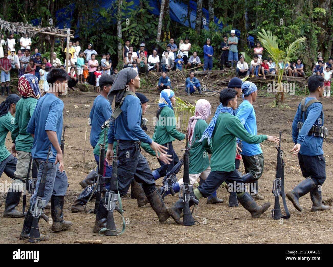 Newly graduated cadets of the New Peoples Army (NPA), armed group of ...