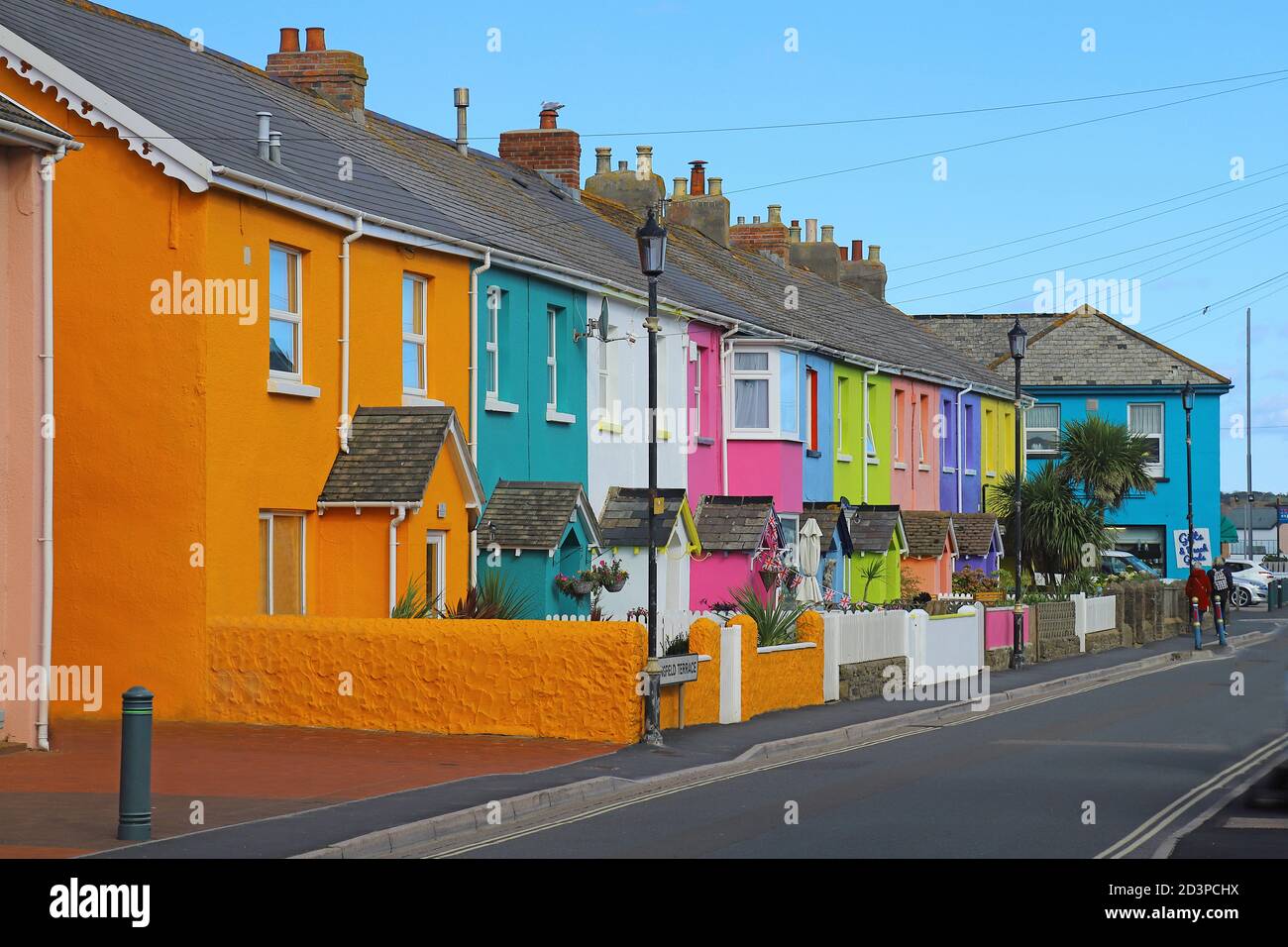 Bright coloured seaside terraced houses Stock Photo - Alamy