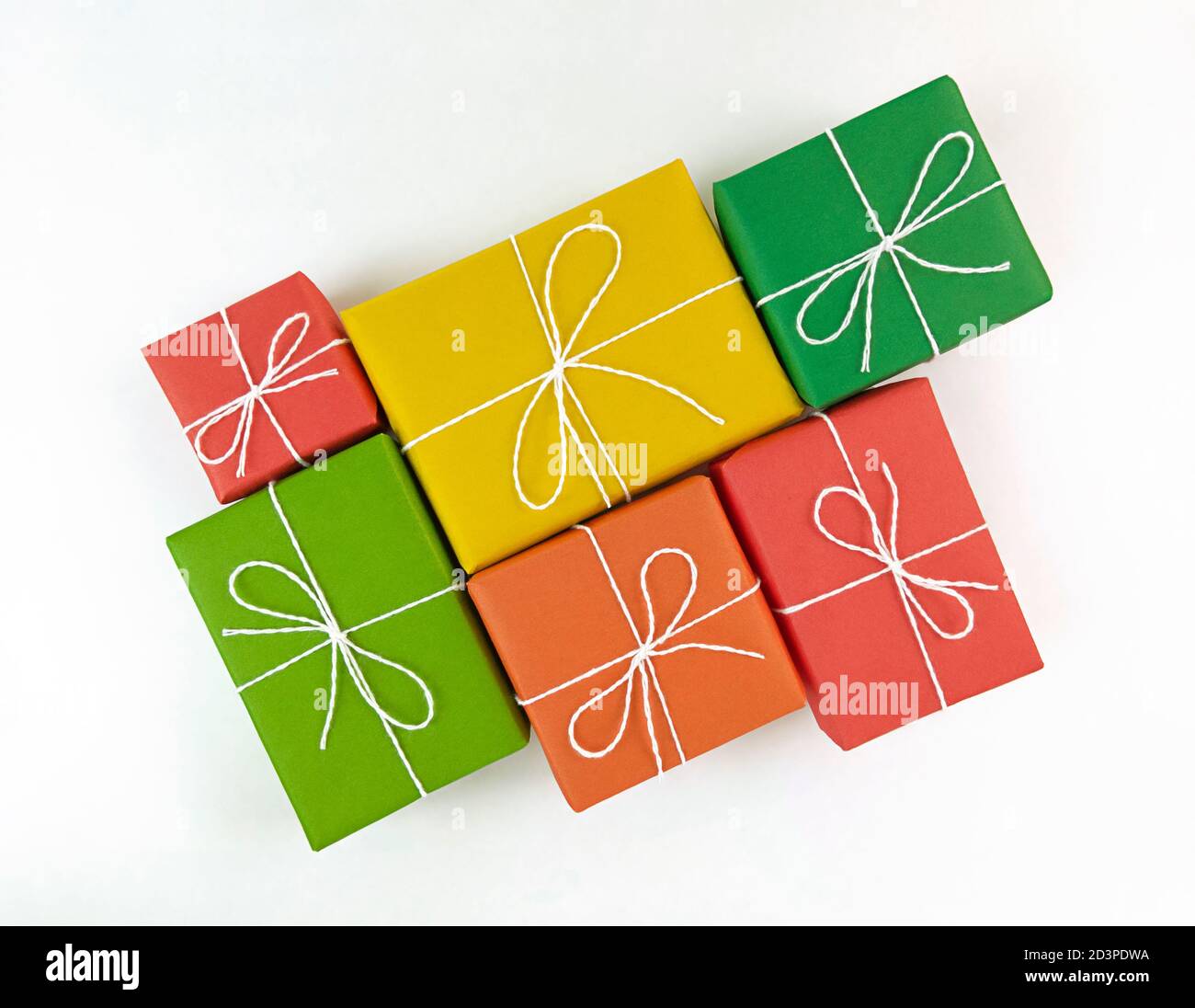 Red, yellow, green and orange gift boxes on a white background Stock ...