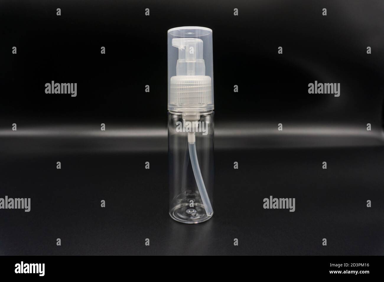 Empty pump clear plastic container. Antiseptic bottle isolated on gray ...