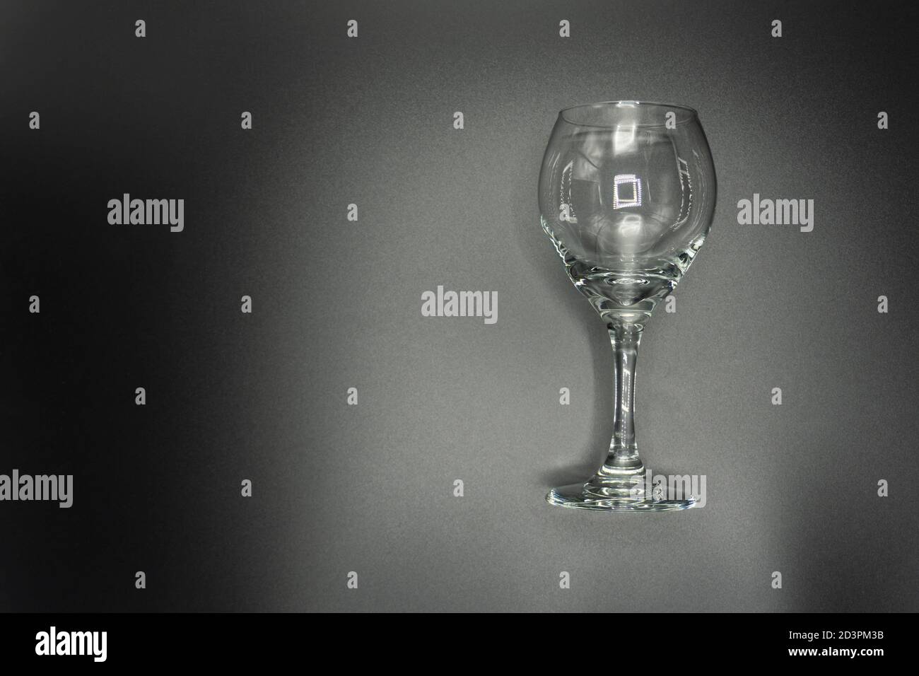 Empty wine glass. Side view isolated on gray background Stock Photo - Alamy