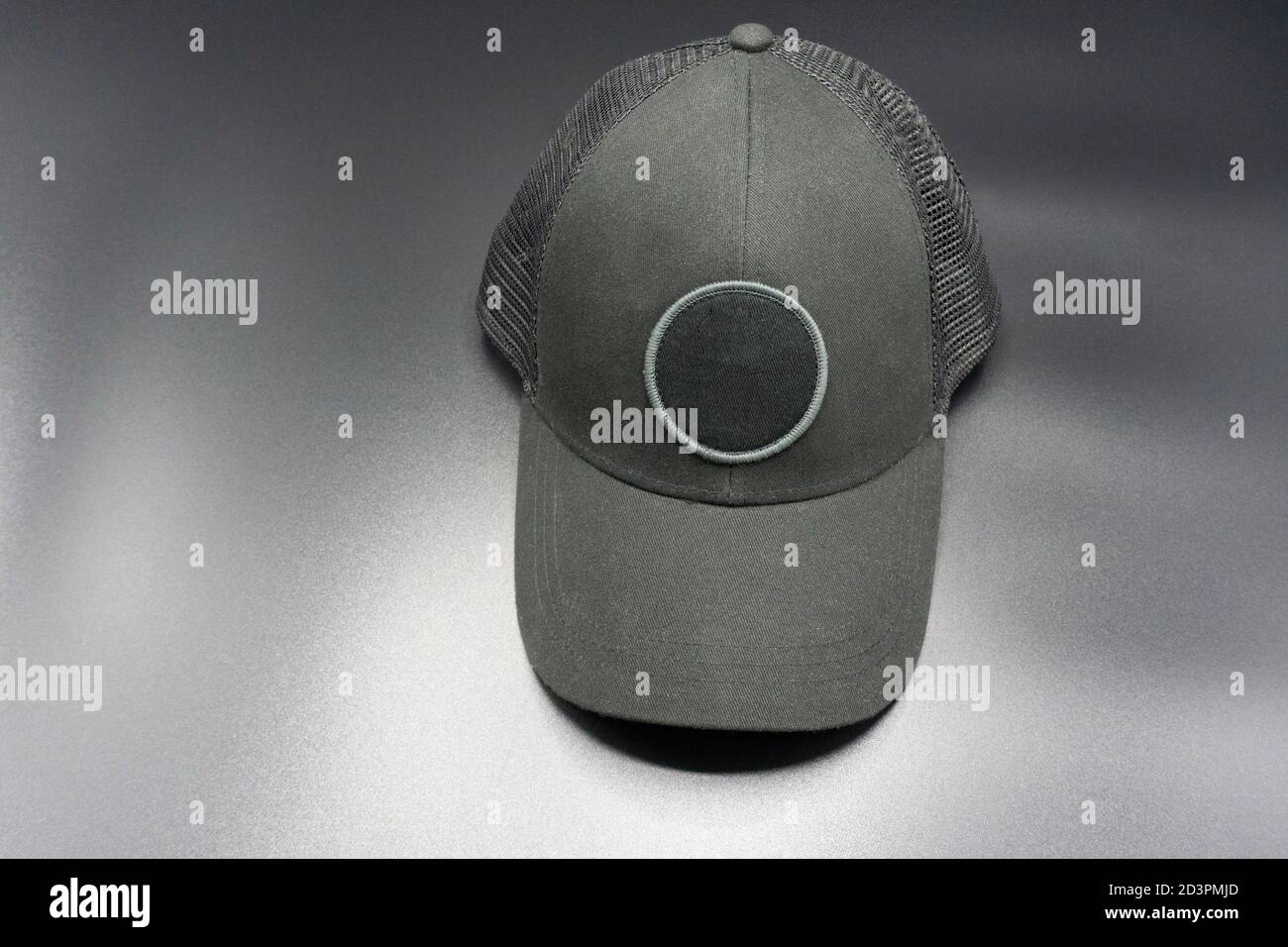 Black baseball cap with round space for logo. Top front view, isolated ...
