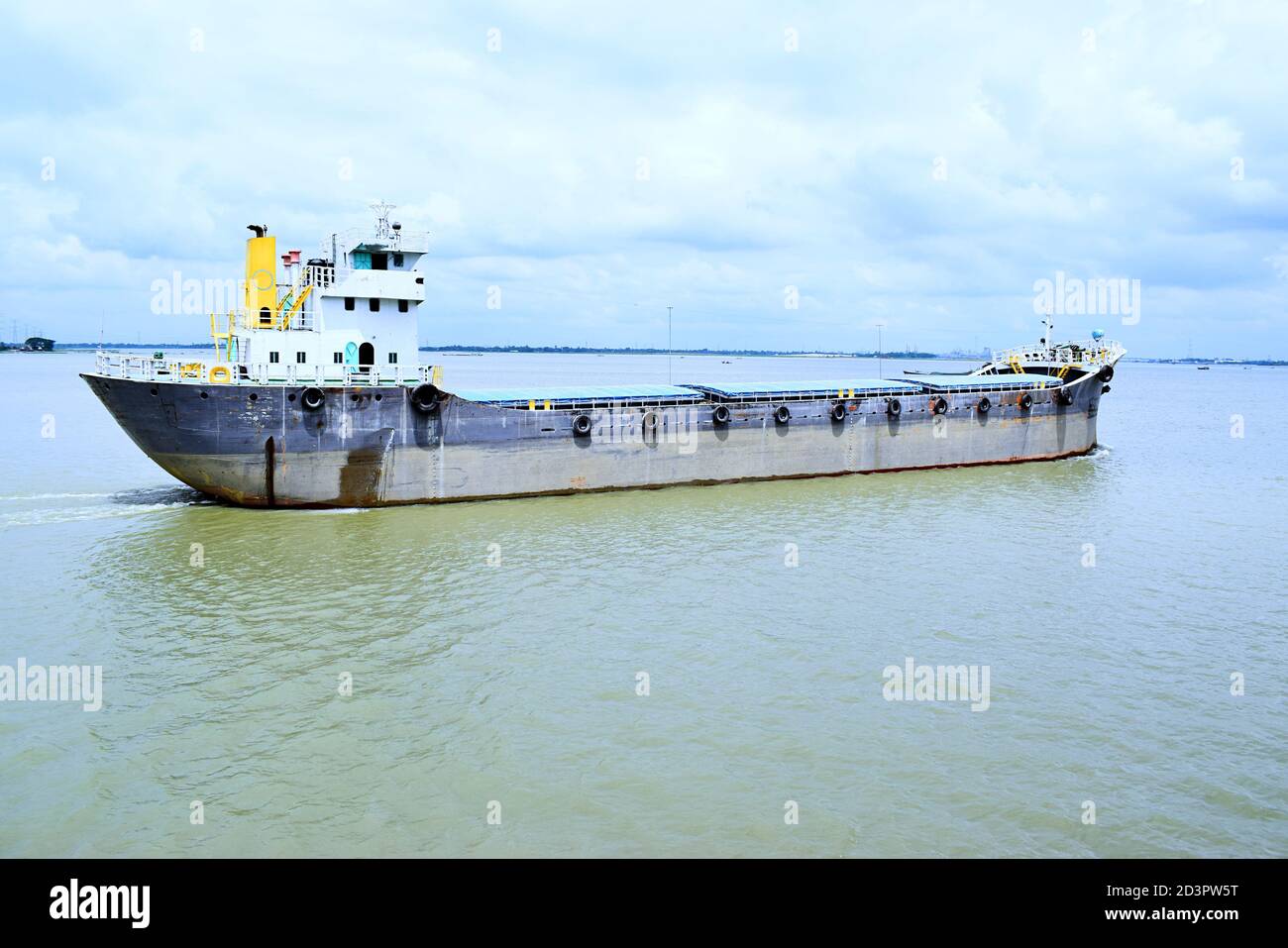 The cargo ship transportation in the River,Cargo ship sailing Stock ...