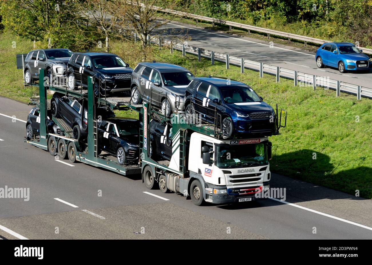 A BCA Automotive transporter carrying new Land Rover cars on the M40 ...