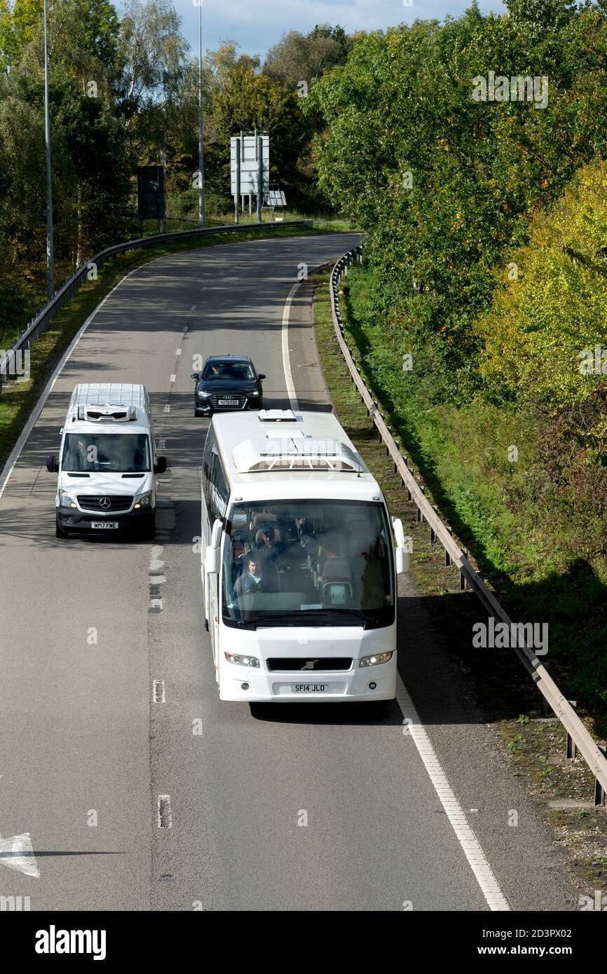 A coach on the slip road at Junction 15 of the M40 motorway ...