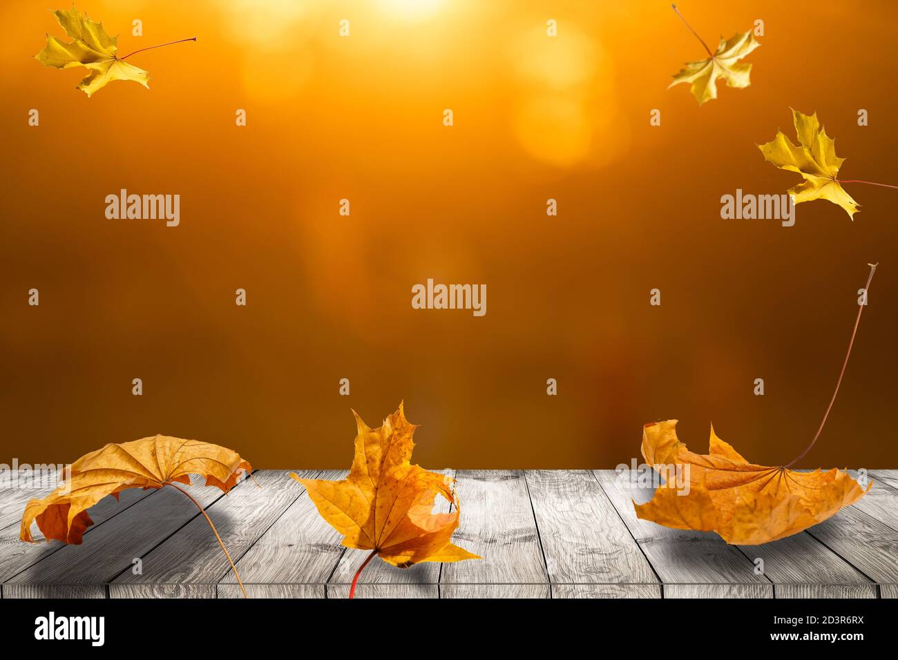 Wooden table with orange fall leaves, autumn natural background Stock ...