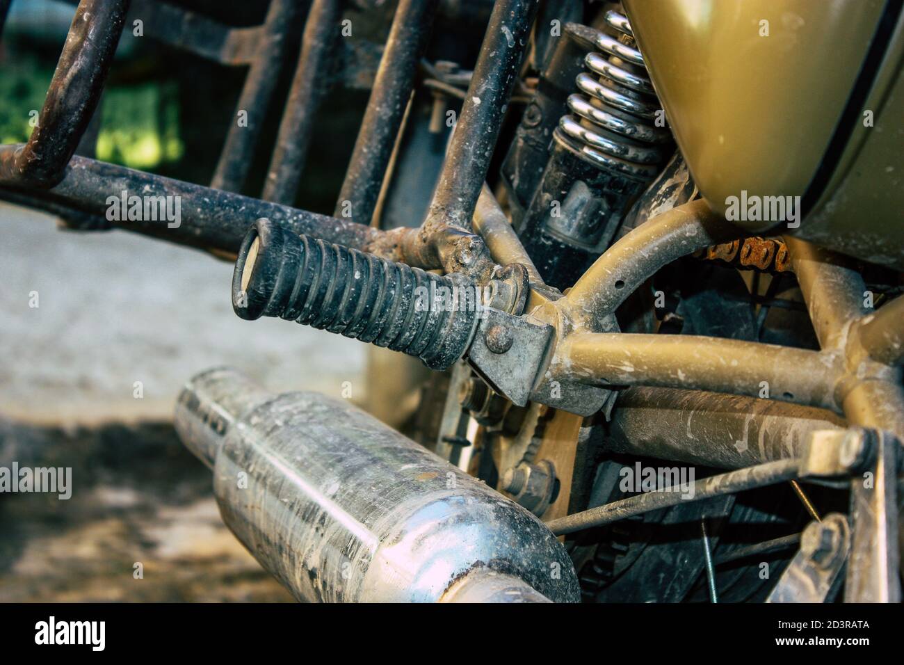 Closeup of a motorcycle rolling in the streets of the city center of ...