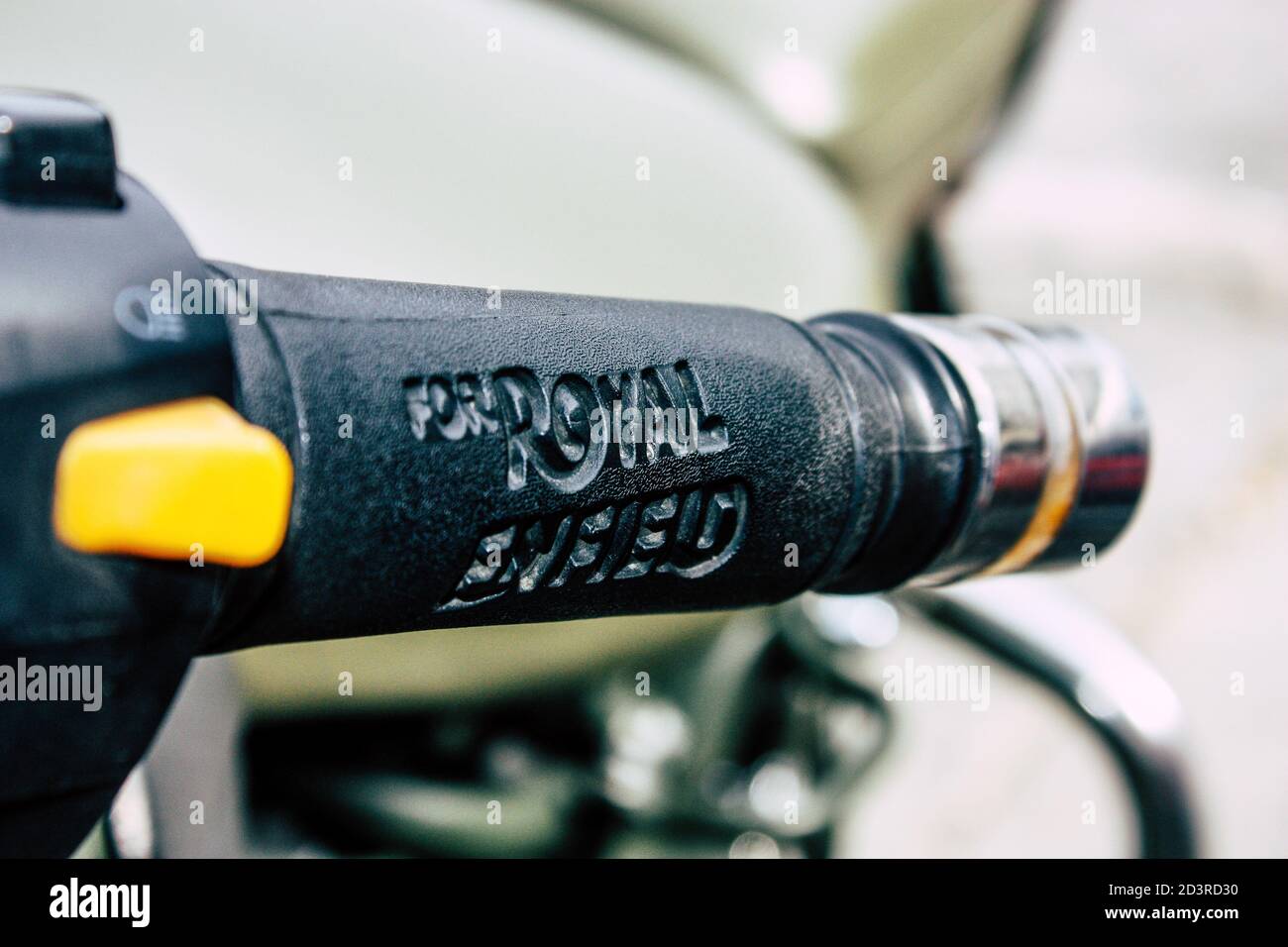Closeup of a motorcycle rolling in the streets of the city center of ...