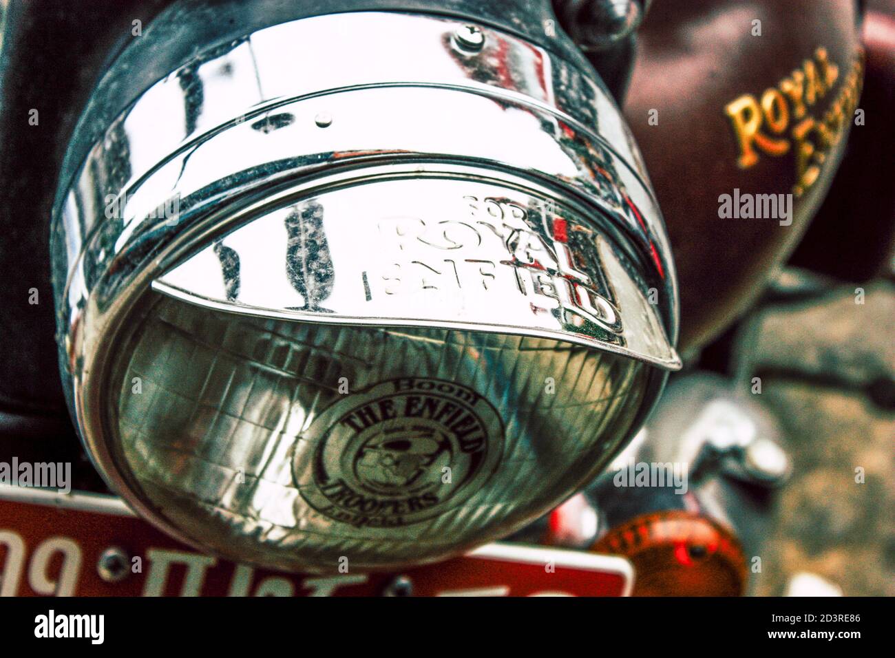 Closeup of a motorcycle rolling in the streets of the city center of ...