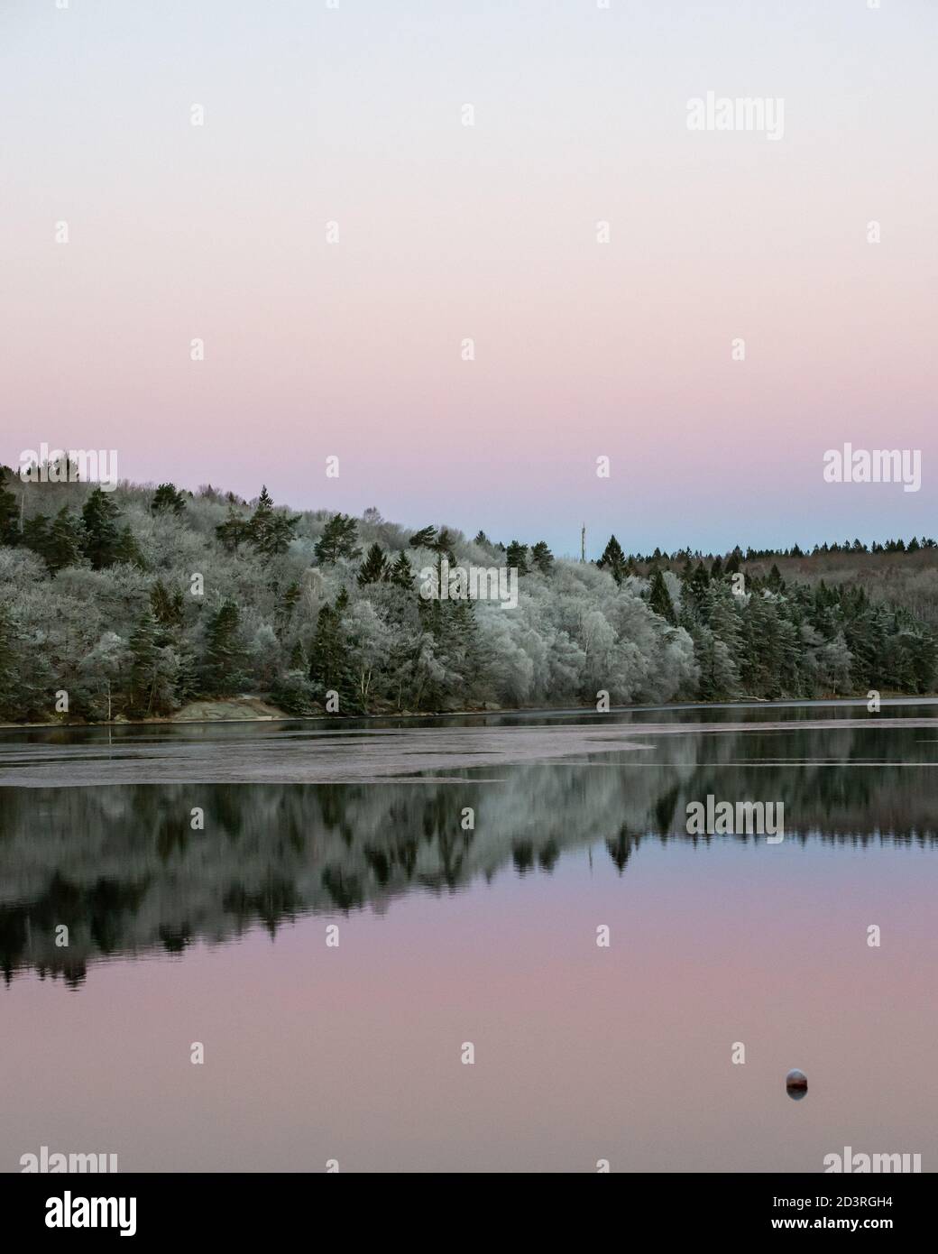 Calm water and reflections from trees and sky Stock Photo - Alamy