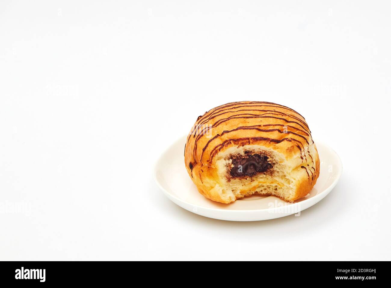 chocolate bitten donut on white background isolate, copy space Stock ...