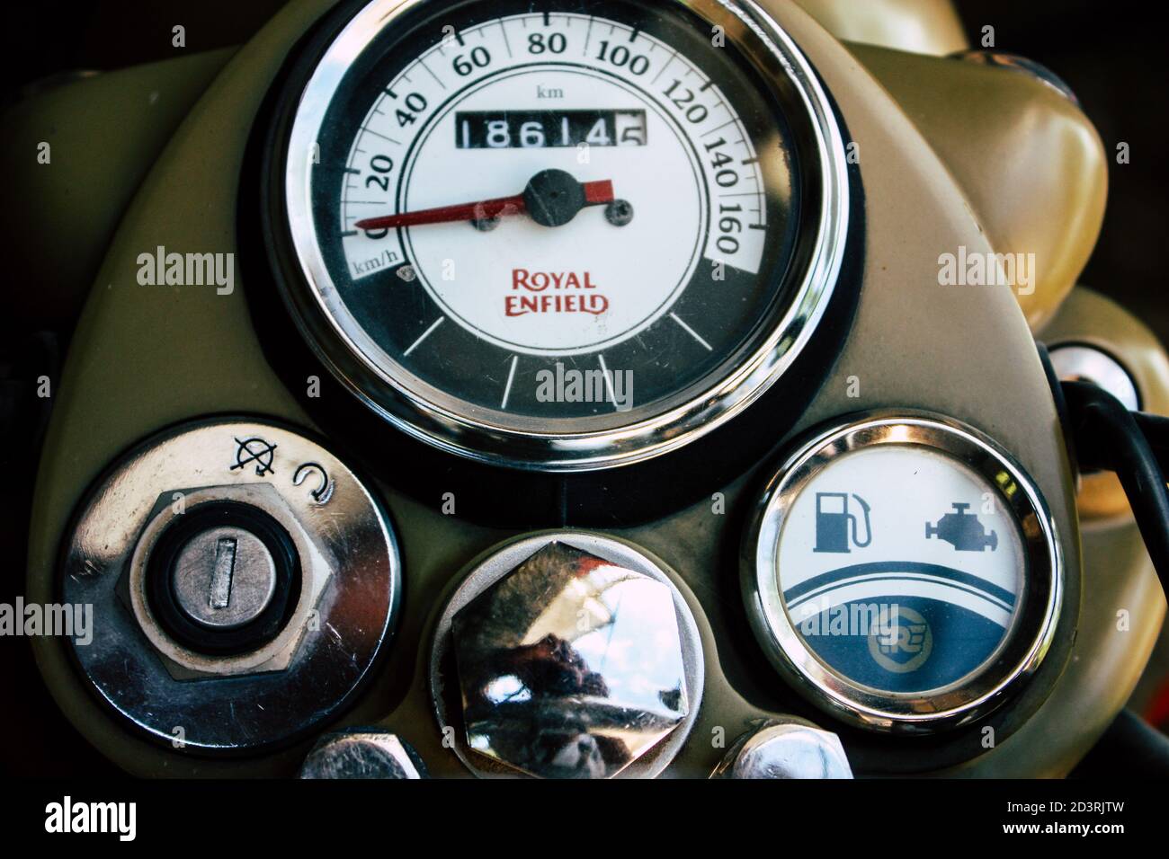 Closeup of a motorcycle rolling in the streets of the city center of ...