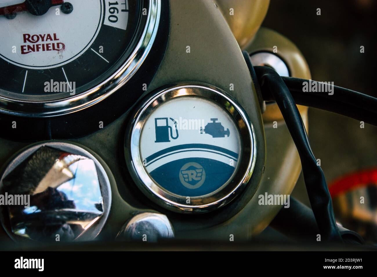 Closeup of a motorcycle rolling in the streets of the city center of ...