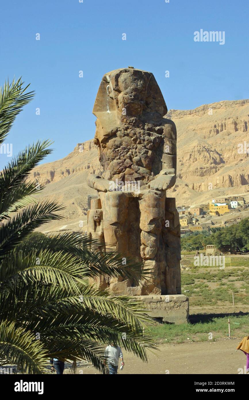 Colossi of Memnon, statues of King Amenhotep III in Nile valley, Luxor ...