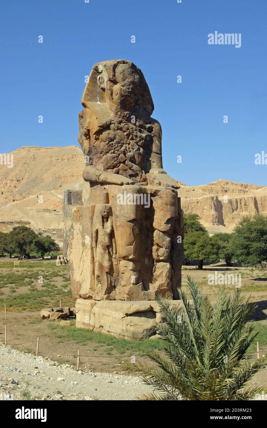 Colossi of Memnon, statues of King Amenhotep III in Nile valley, Luxor ...