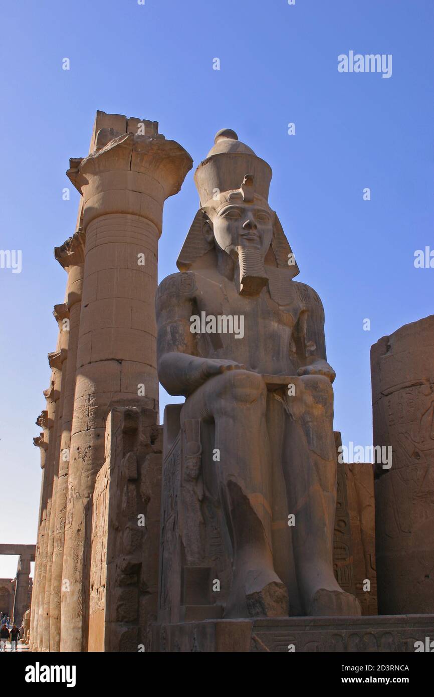 Pharaoh Rameses II stone Statue in Luxor Temple Stock Photo - Alamy