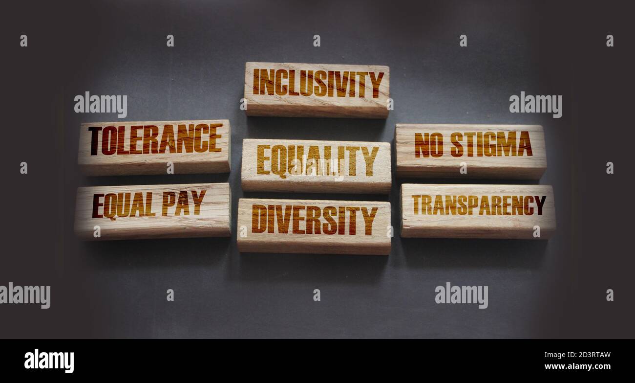 Inclusivity tolerance diversity transparency concept with wooden blocks ...