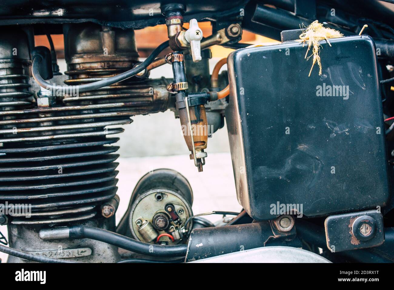 Closeup of a motorcycle rolling in the streets of the city center of ...
