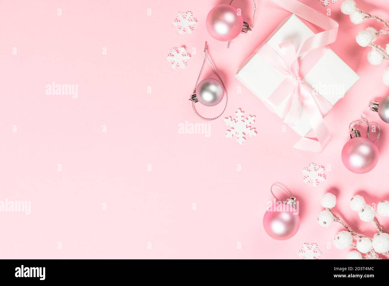 Christmas present box and decorations on pink background Stock Photo ...