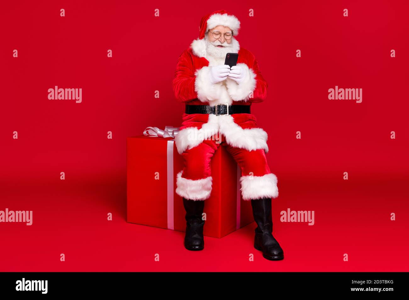 Full length body size view of his he handsome cheerful bearded Santa ...