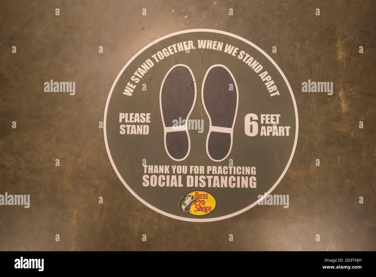 Stand Apart Stand Together designation floor sign in a Bass Pro Shop in ...