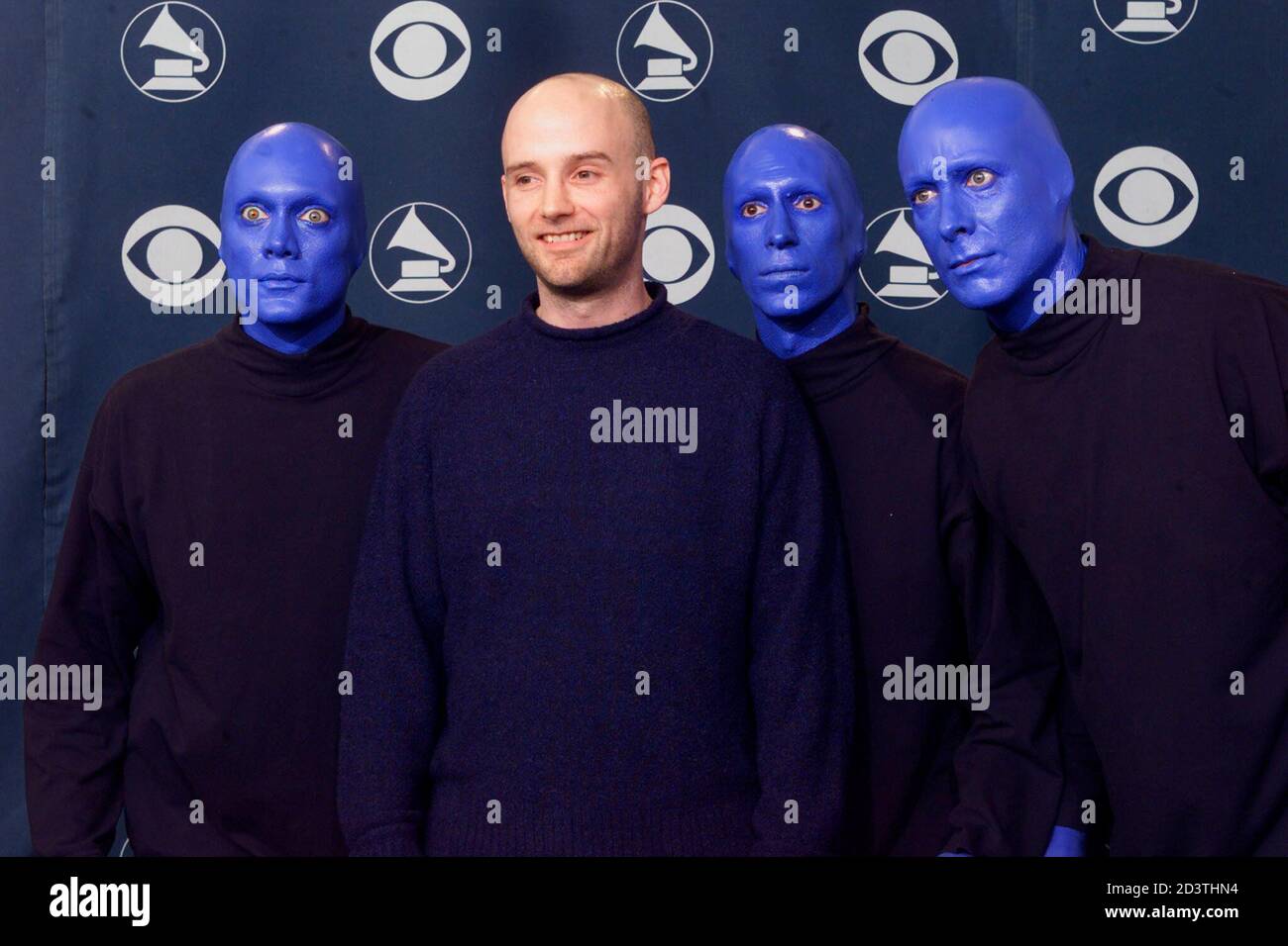 Singer Moby (C) and Blue Man Group pose backstage at the 43rd annual ...