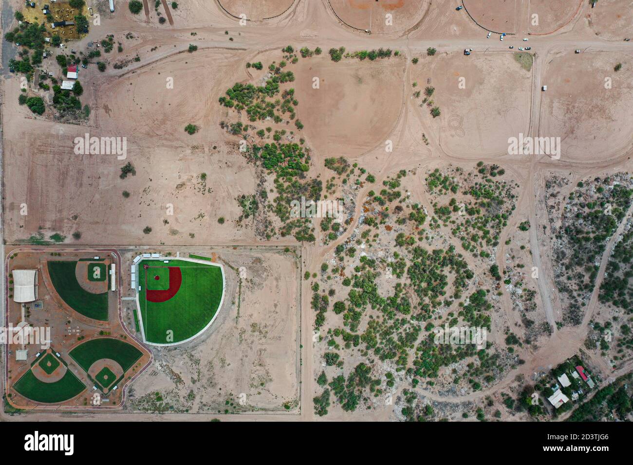 aerial view of sports complex, baseball sports fields, dirt or clay ...