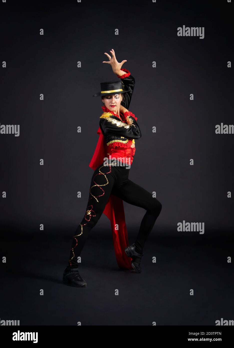 Plastic woman gracefully dancing in a stage costume stylized as a ...
