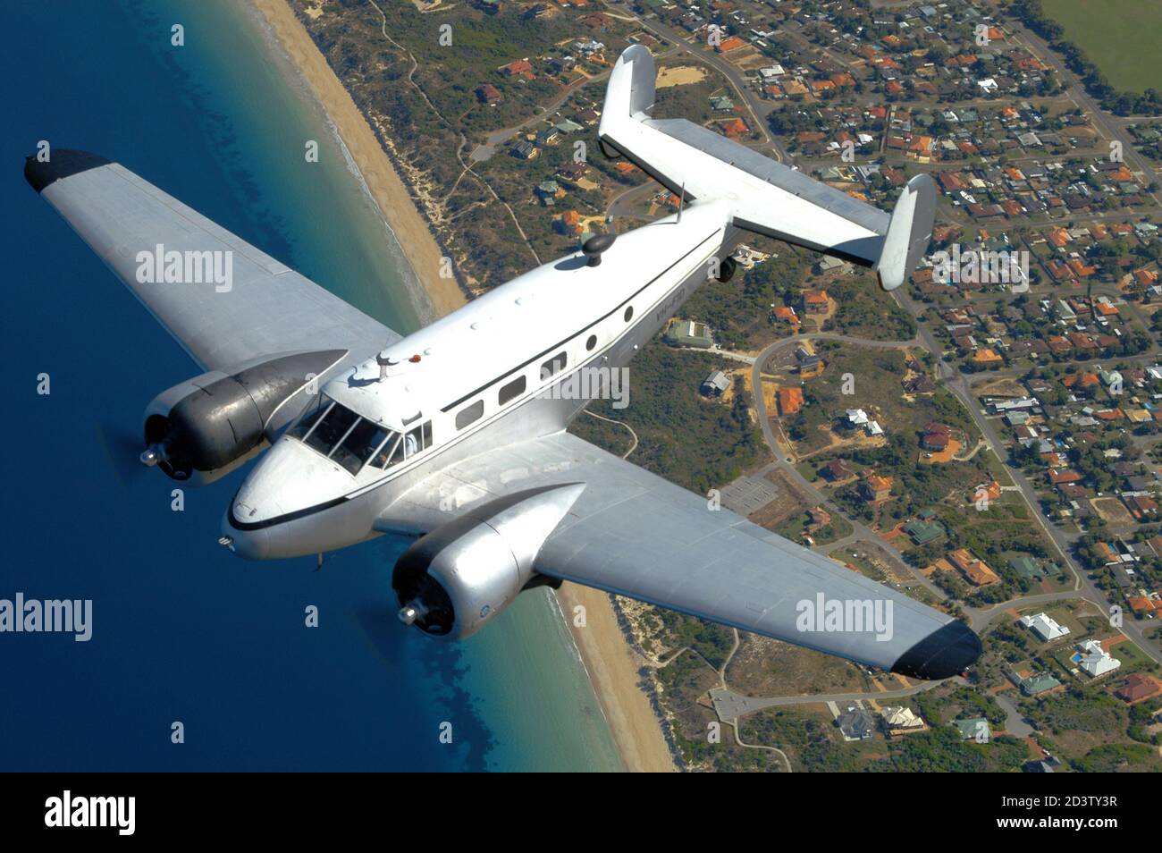 An air to air portrait of a 1930's Beech 18 twin engine transport ...