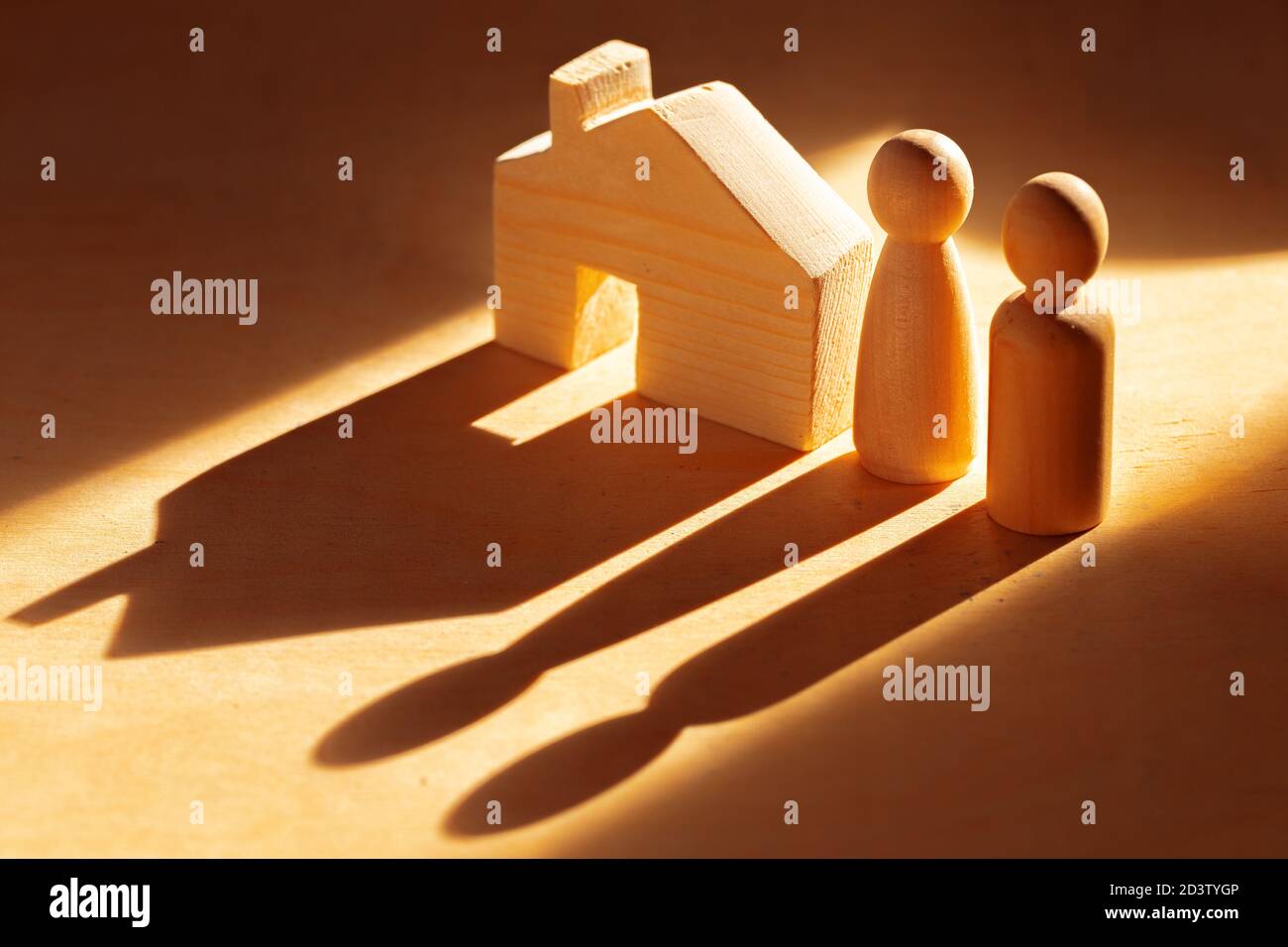 Wooden men figures and toy wooden house Stock Photo - Alamy